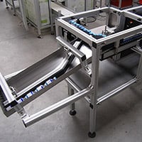 Pharmaceutical Industry: Random Sampling Custom Conveyor